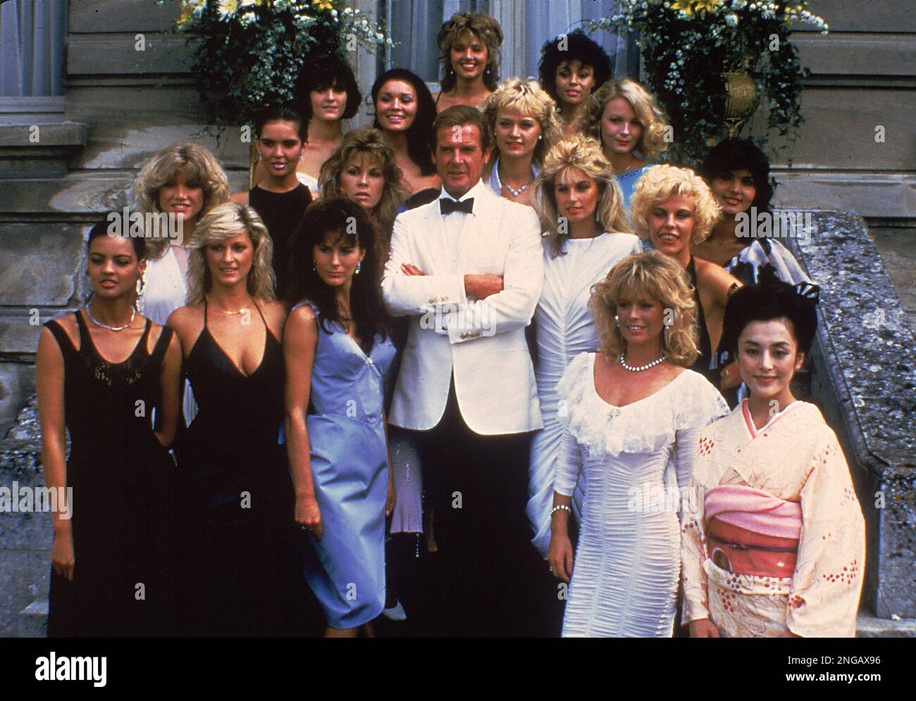 British movie actor Roger Moore, center, poses in his role as British ...