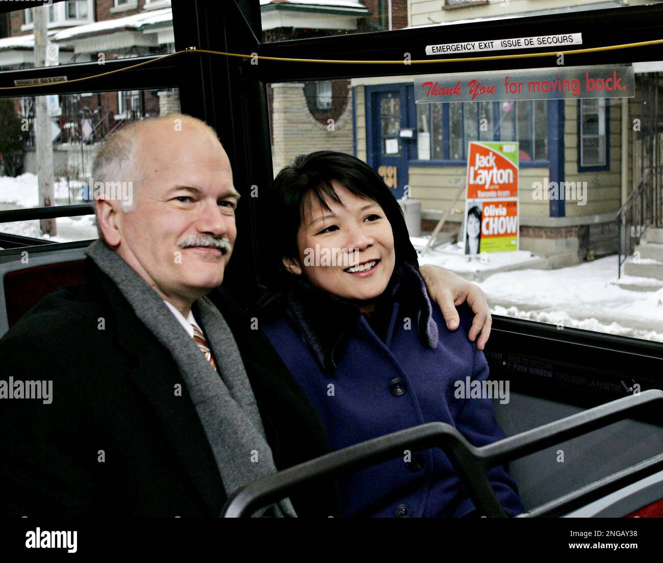 NDP Leader Jack Layton and his wife Olivia Chow ride through Chow's riding as the make their way ...