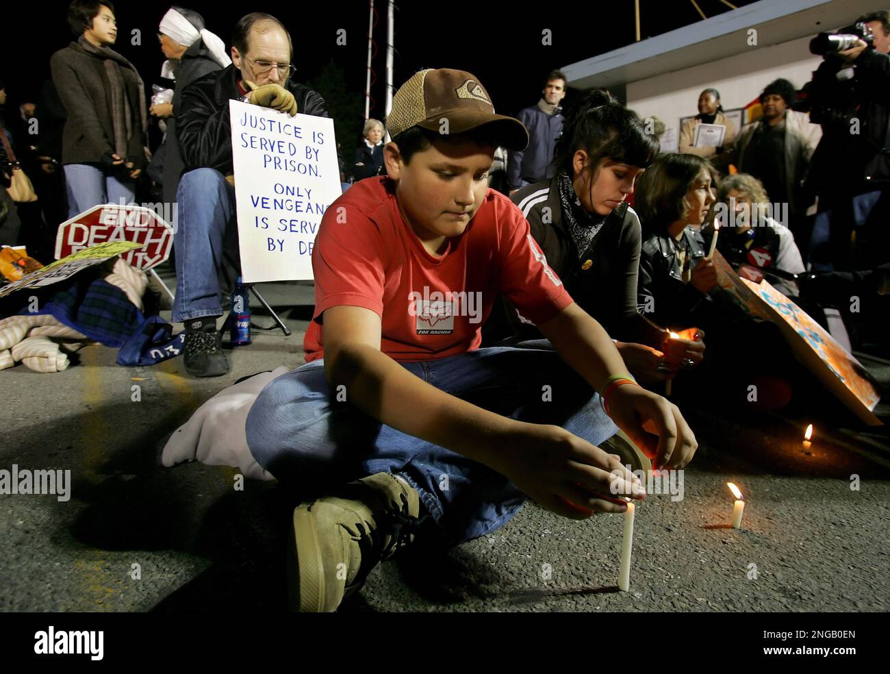 Mark Behrend, seated rear, Jake Matheny, 13, center, Nicole Salois, 29 ...