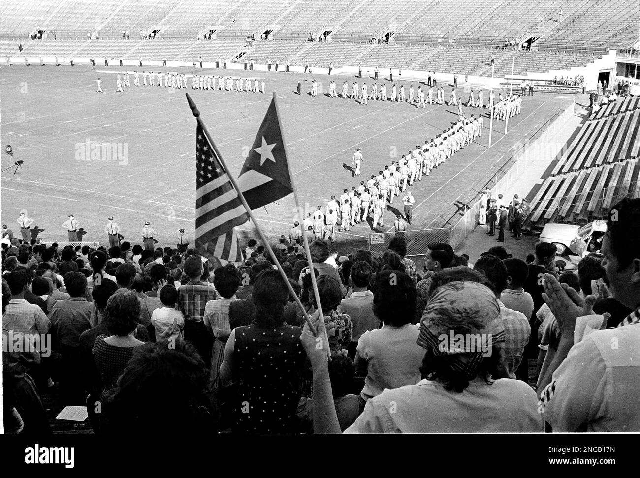 The Cuba invasion Brigade 2506 files onto the field at Orange Bowl ...