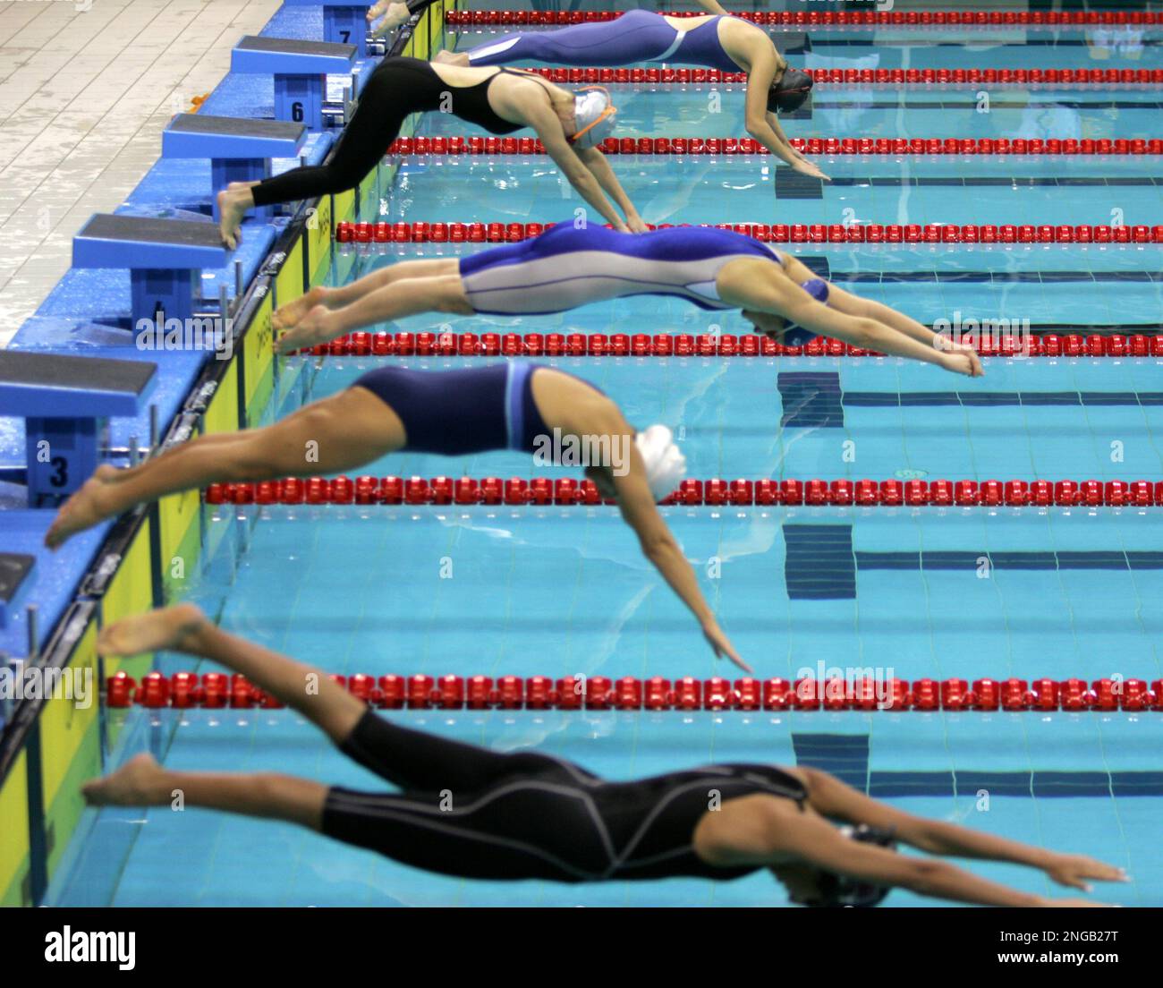 Women's 100m Freestyle swimmers start at the Hamad Aquatic Center ...