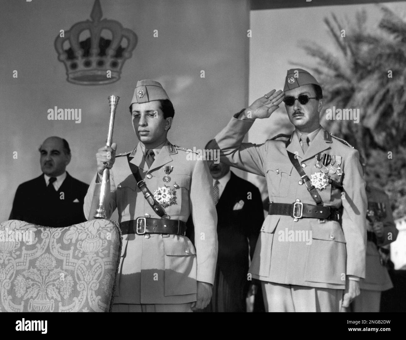 King Faisal II (left) who was enthroned as the third reigning monarch ...