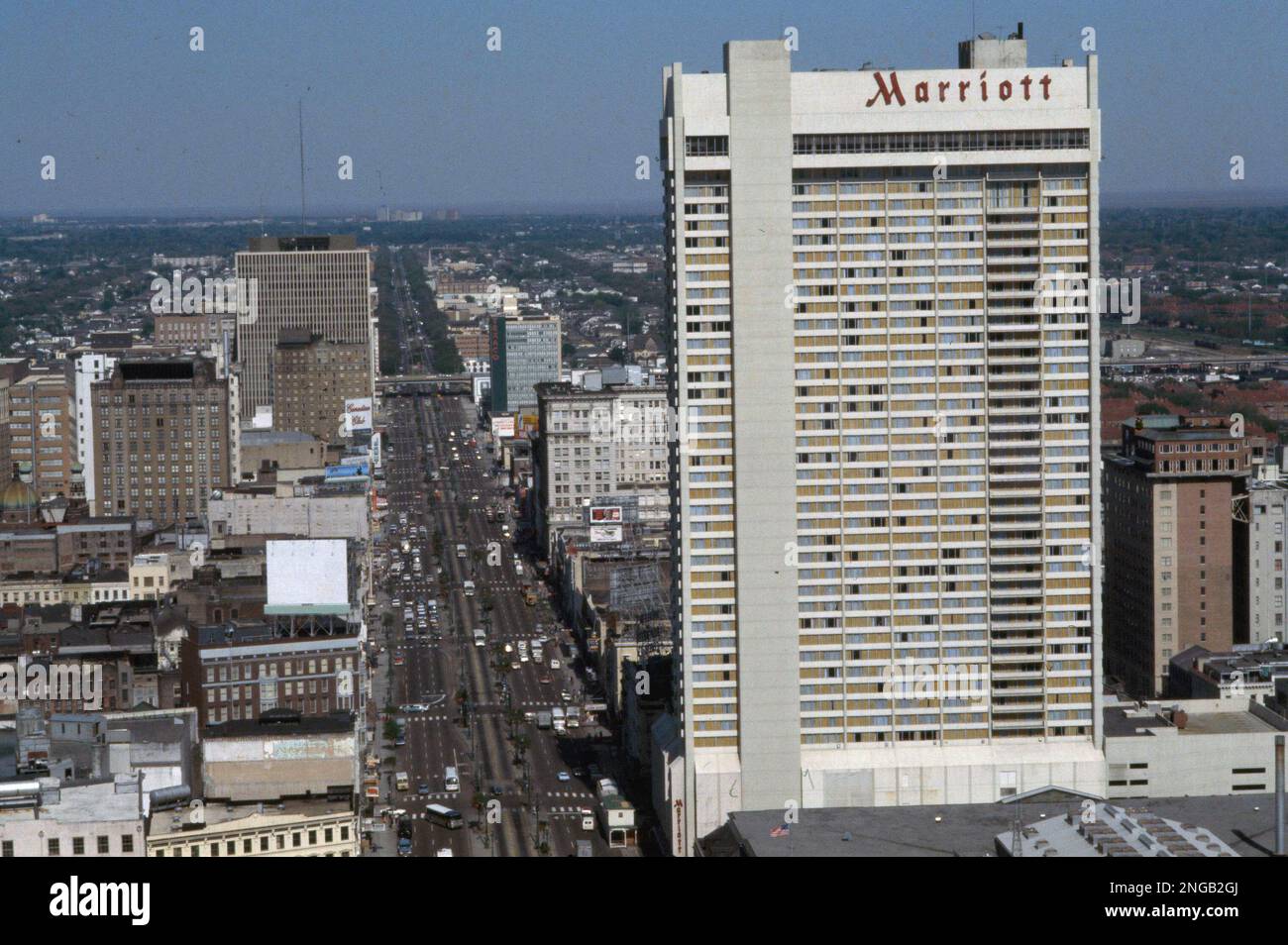 The New Orleans Marriott Hotel is seen towering over Canal Street in ...