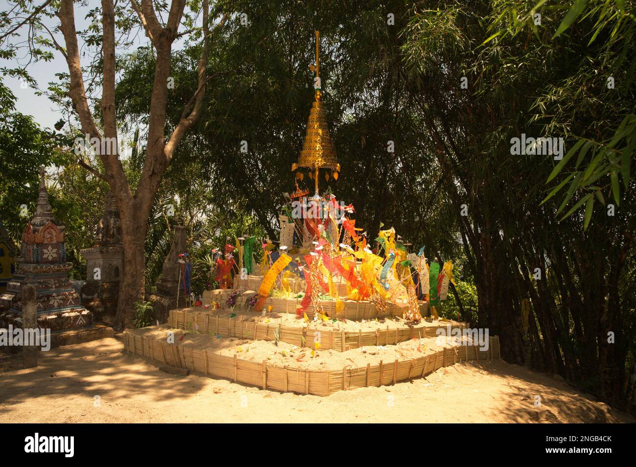 Pagoda made of sand and have colorful flags embroidered in Thai temples ...