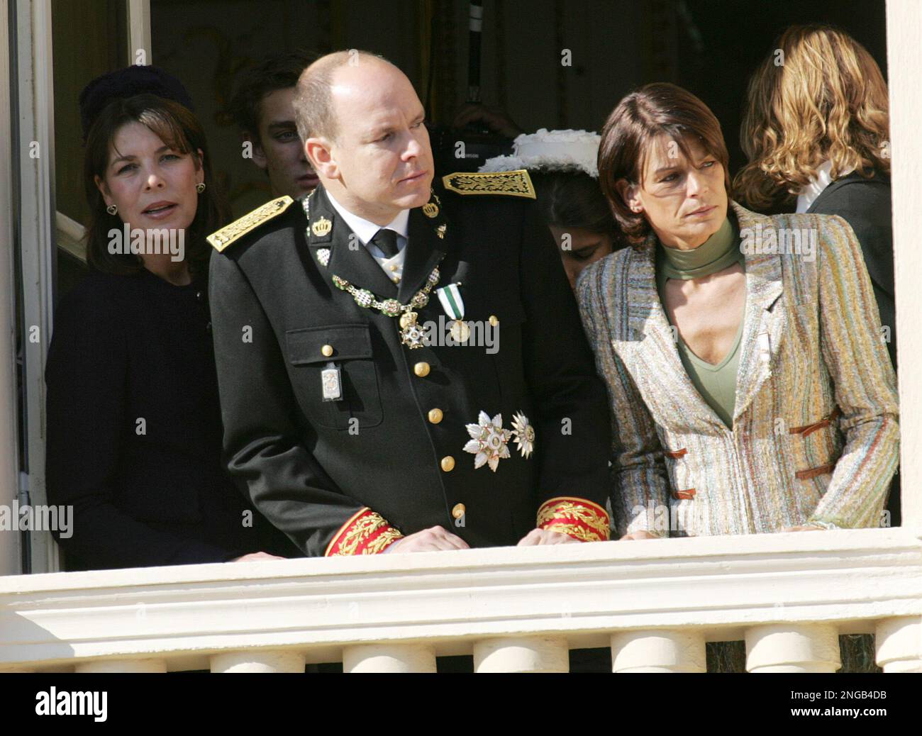 Prince Albert II of Monaco, center, Princess Caroline of Hanover, left ...