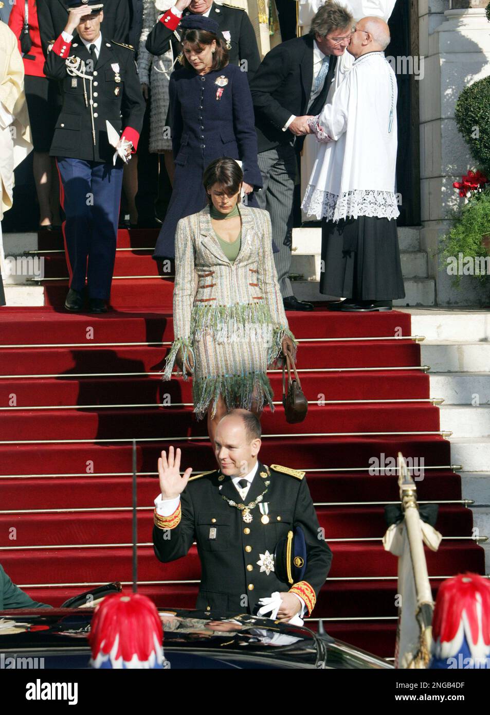 Prince Albert II of Monaco waves, followed by his sisters Princess ...