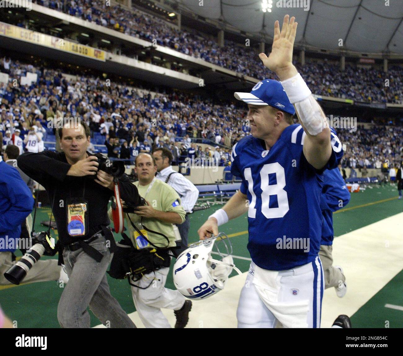 Indianapolis Colts quarterback Peyton Manning waves to the fans after a ...