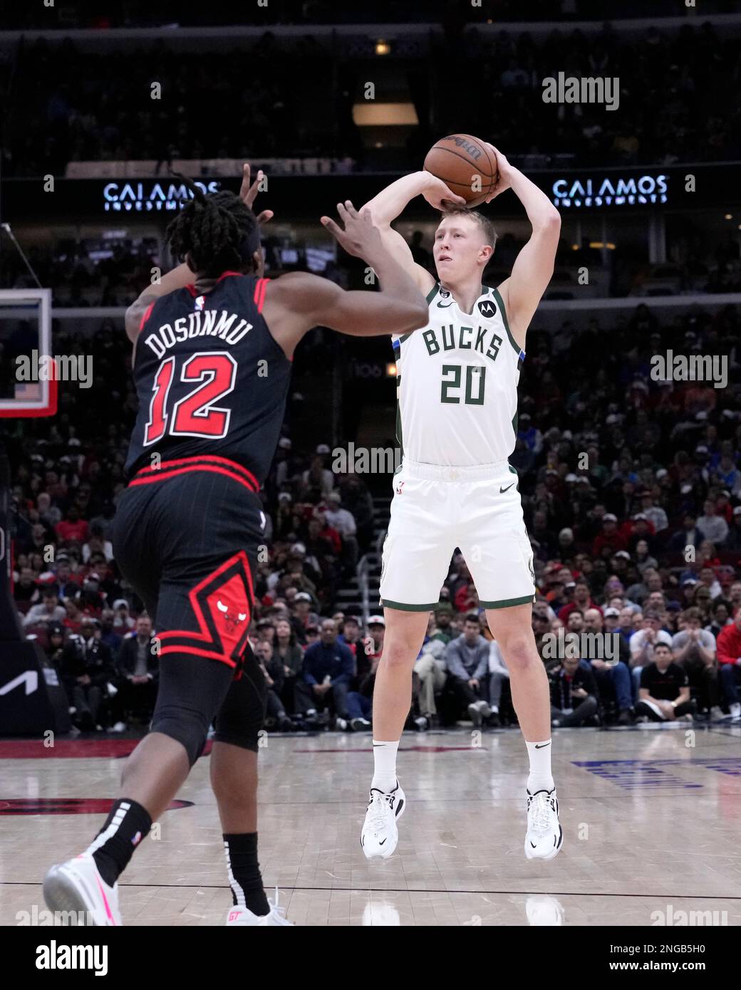 Milwaukee Bucks' AJ Green shoots as Chicago Bulls' Ayo Dosunmu defends ...