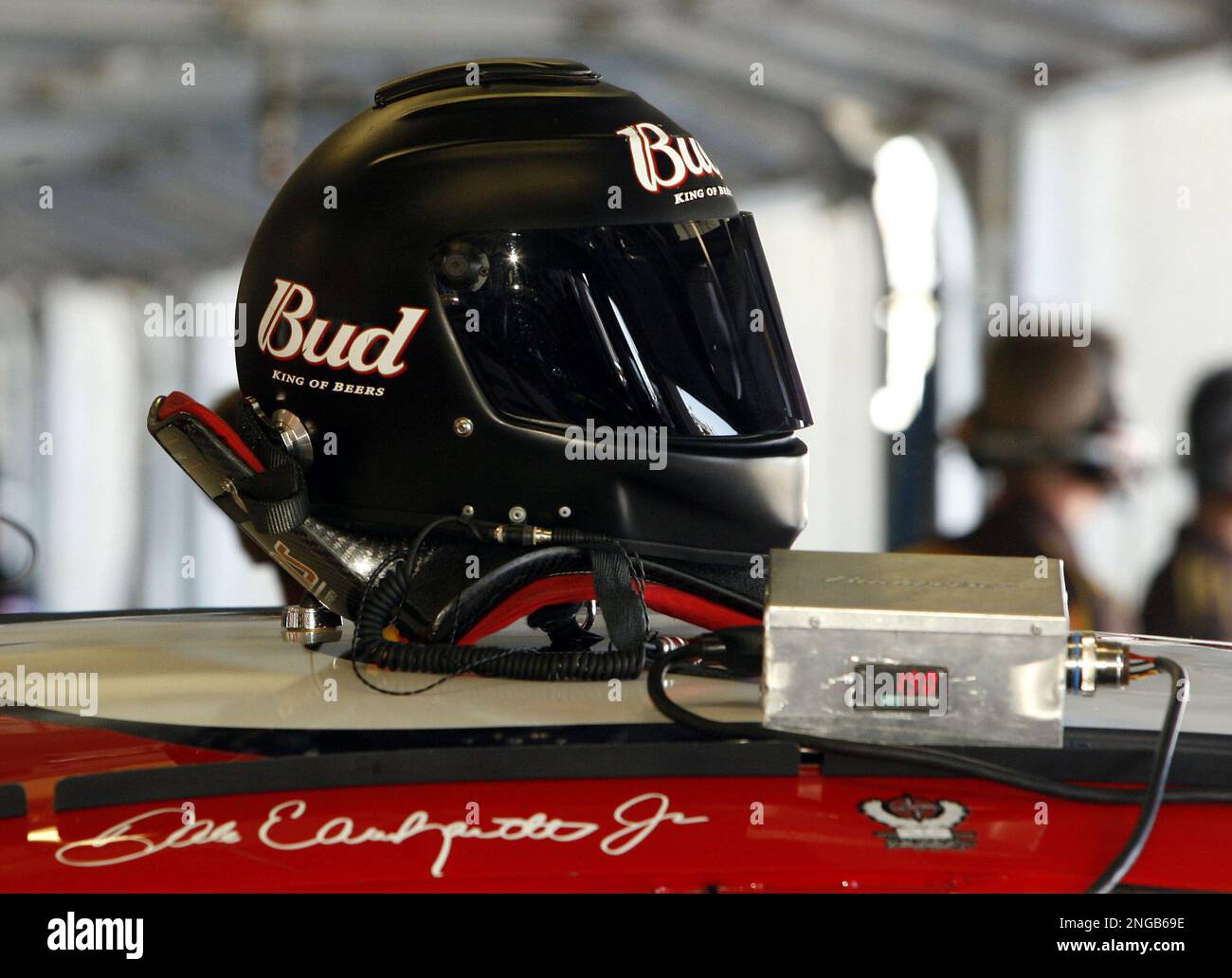 NASCAR driver Dale Earnhardt Jr's helmet sits on his vehicle in the ...
