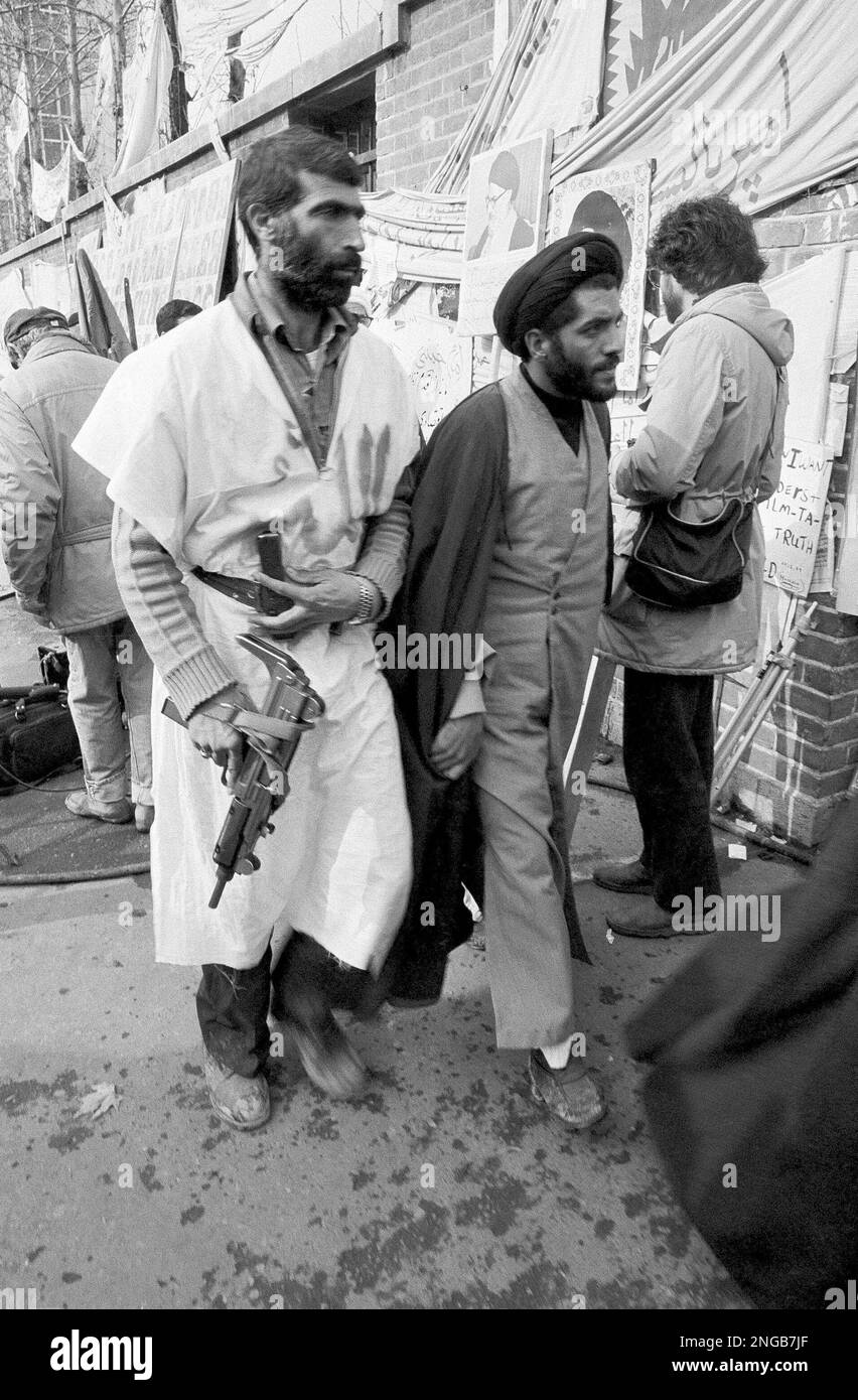 A mullah visits the U.S. Embassy, Dec. 27, 1979, with his body guard ...