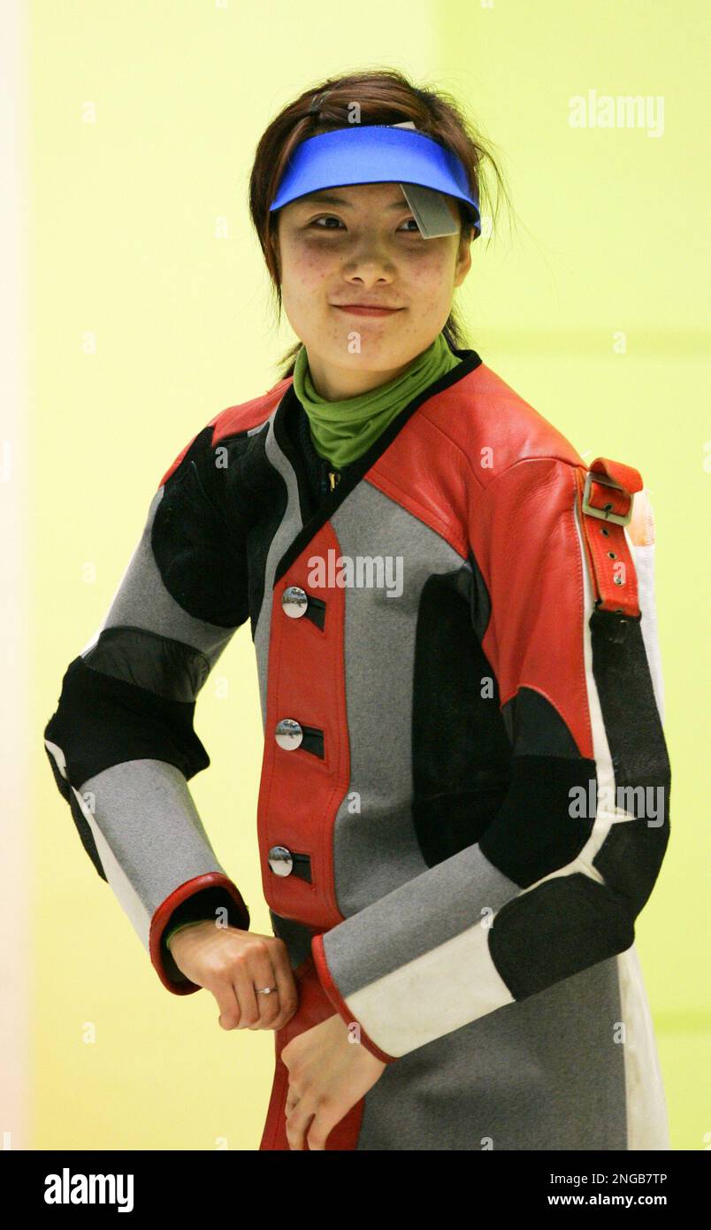 Olympic gold medalist Du Li of China smiles after winning the women's ...