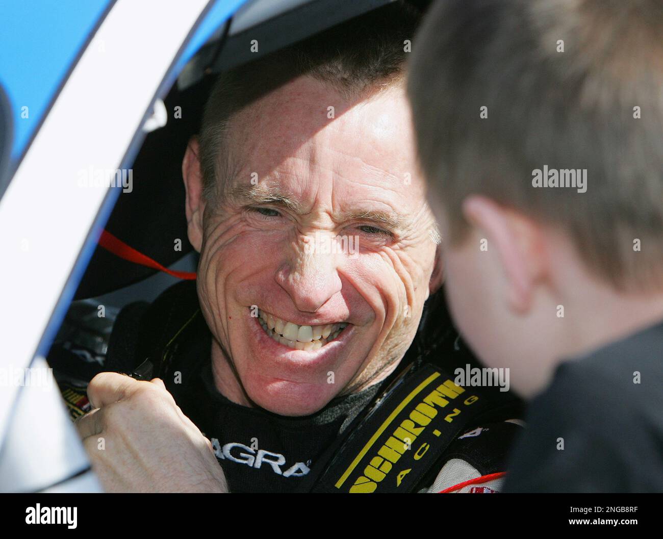 Mark Martin, driver of the No. 6 Viagra Ford, talks to son Matt from ...