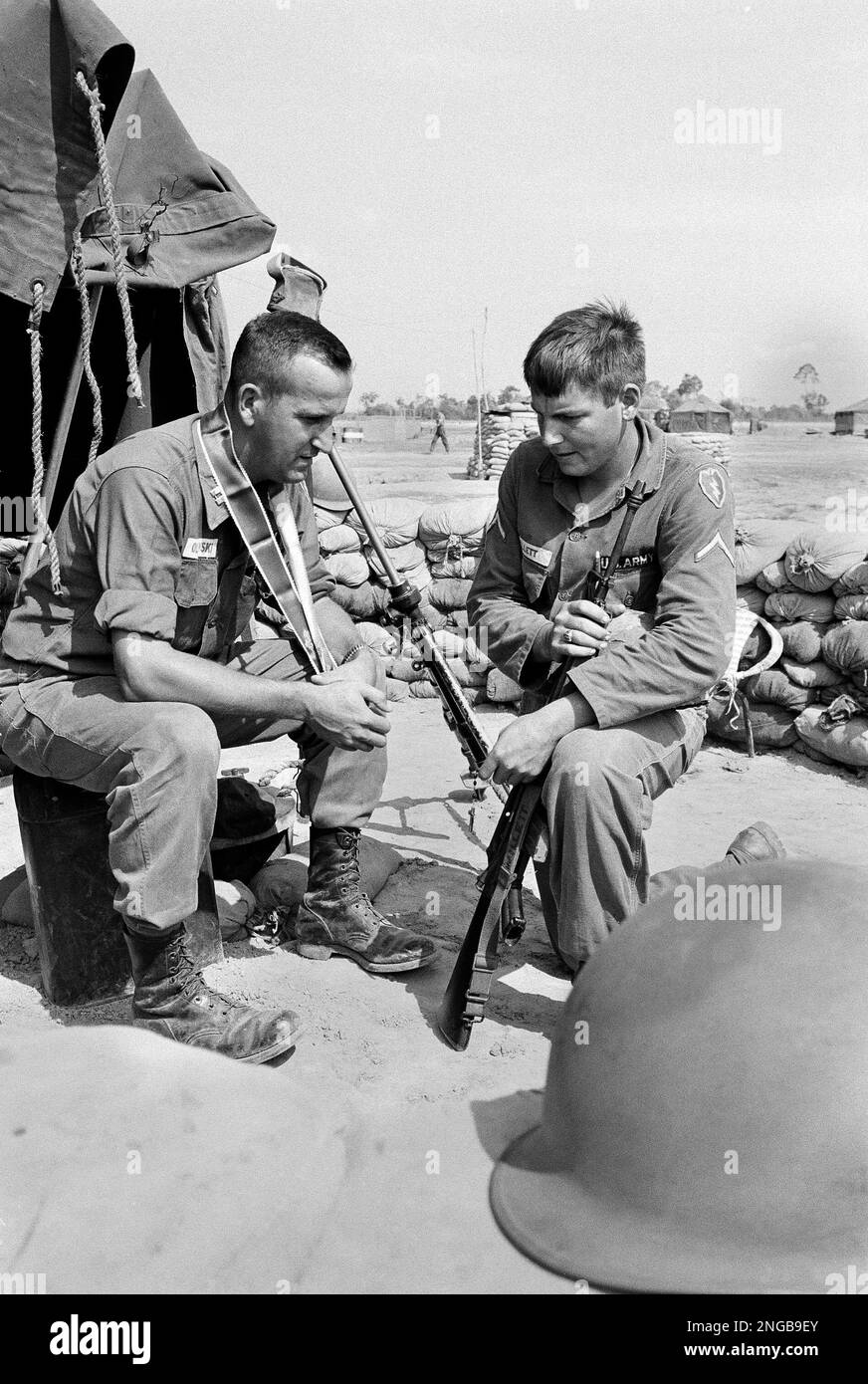 Chaplain Capt. Clarence A. Olszewski, left, listens to the confession ...