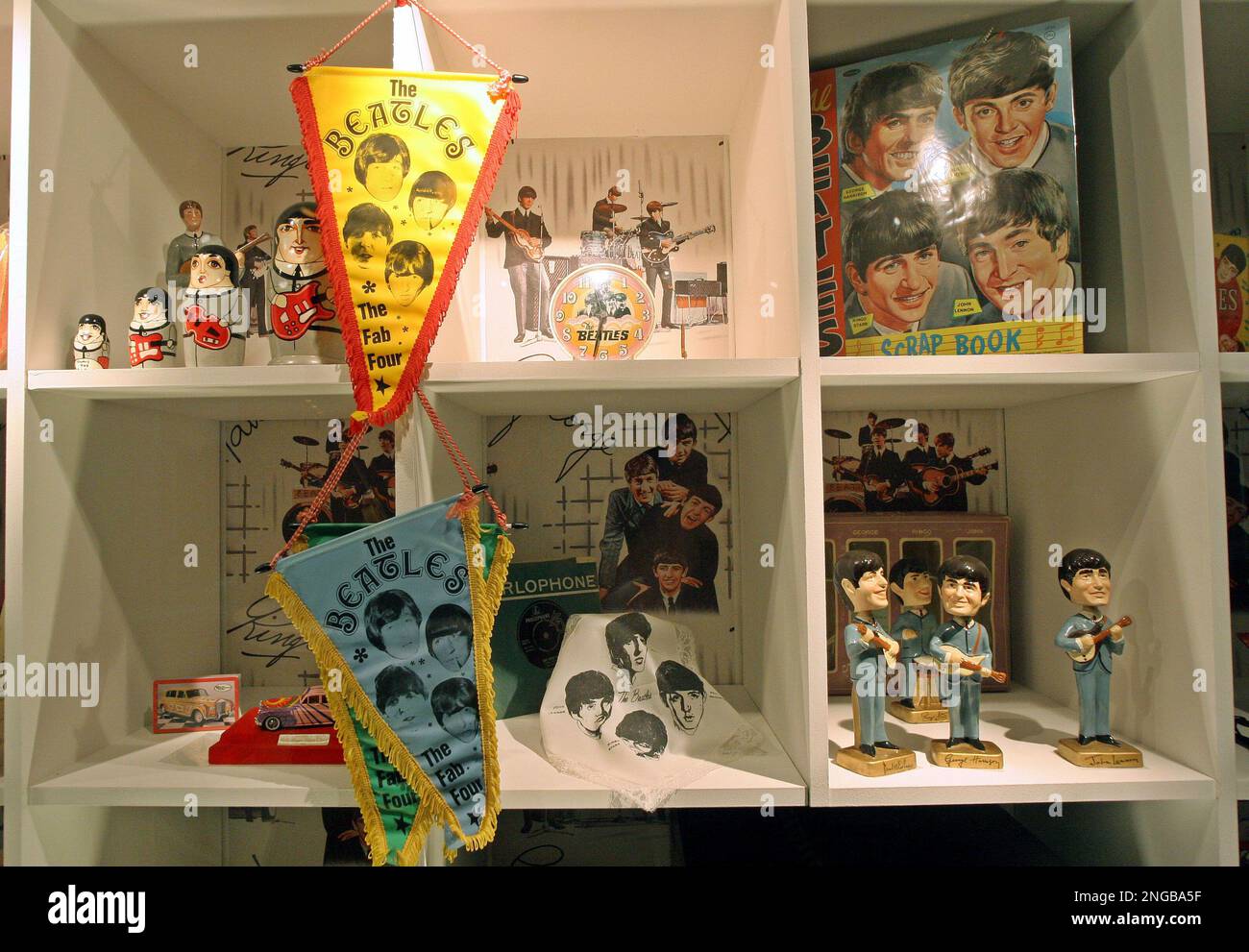 Beatlemania items are on display at the John Lennon exhibition in Paris ...