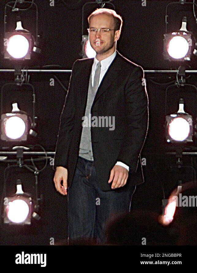 Swedish fashion designer Lars Nilsson appears on the catwalk at the end ...