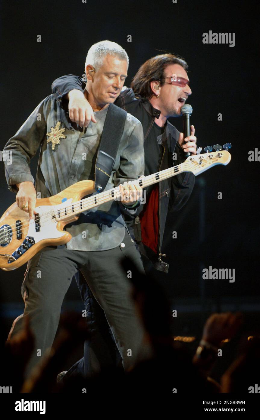 Bono, right, the lead singer of the Irish rock band U2, joins bass ...