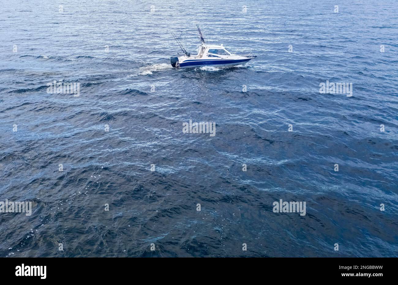 Aerial view fisherman on boat at the ocean. Top view beautiful seascape ...