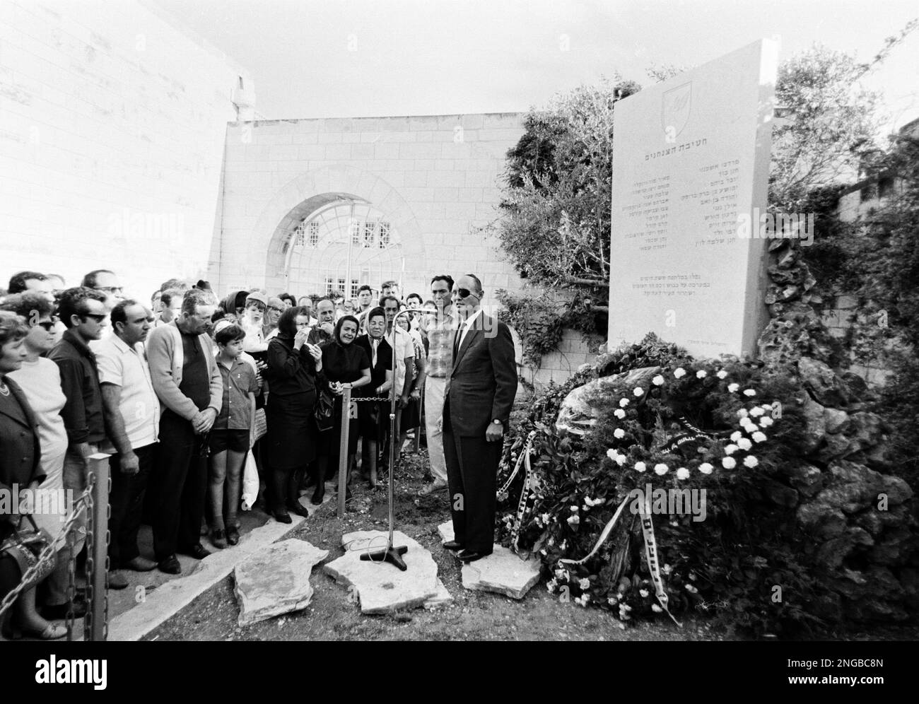 Defense minister Moshe Dayan attends a memorial gathering near the ...