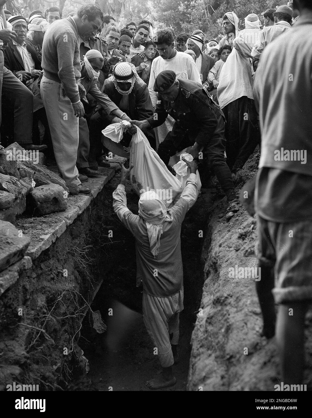 One of 39 bodies discovered in a pit earlier this week near the ...