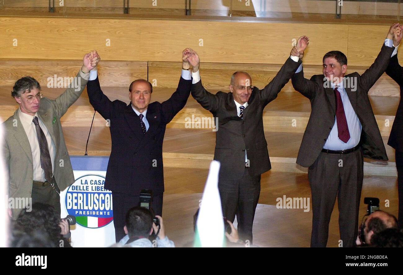 Center-right coalition leader hold hands with Milan's mayor Gabriele ...