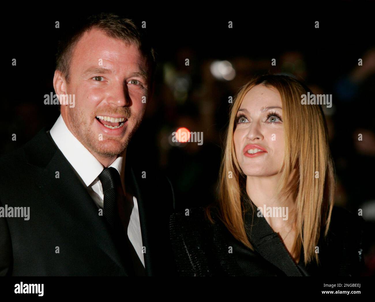 British director Guy Ritchie, left, and his wife US singer Madonna ...