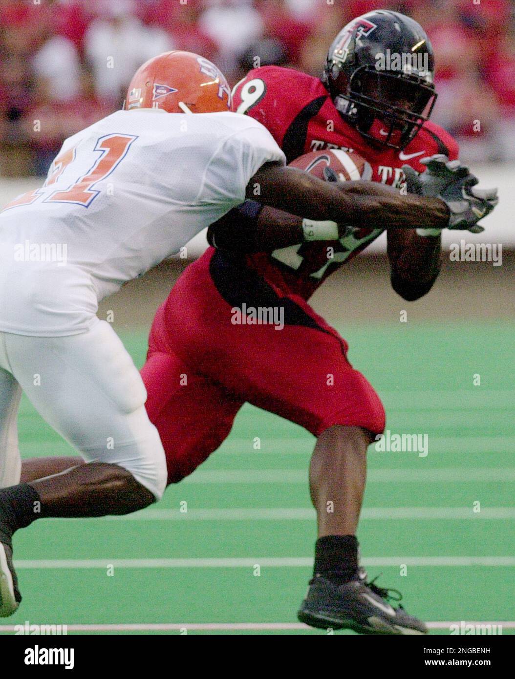 Texas Tech's Taurean Henderson (19) attempts to evade Sam Houston State ...