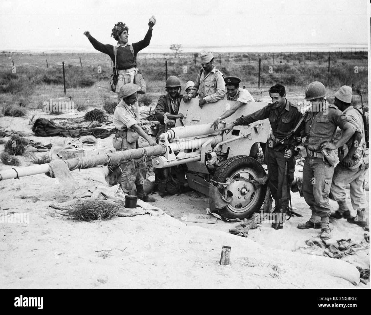 Israeli soldiers look over a captured Soviet-made gun at Rafa, south of ...