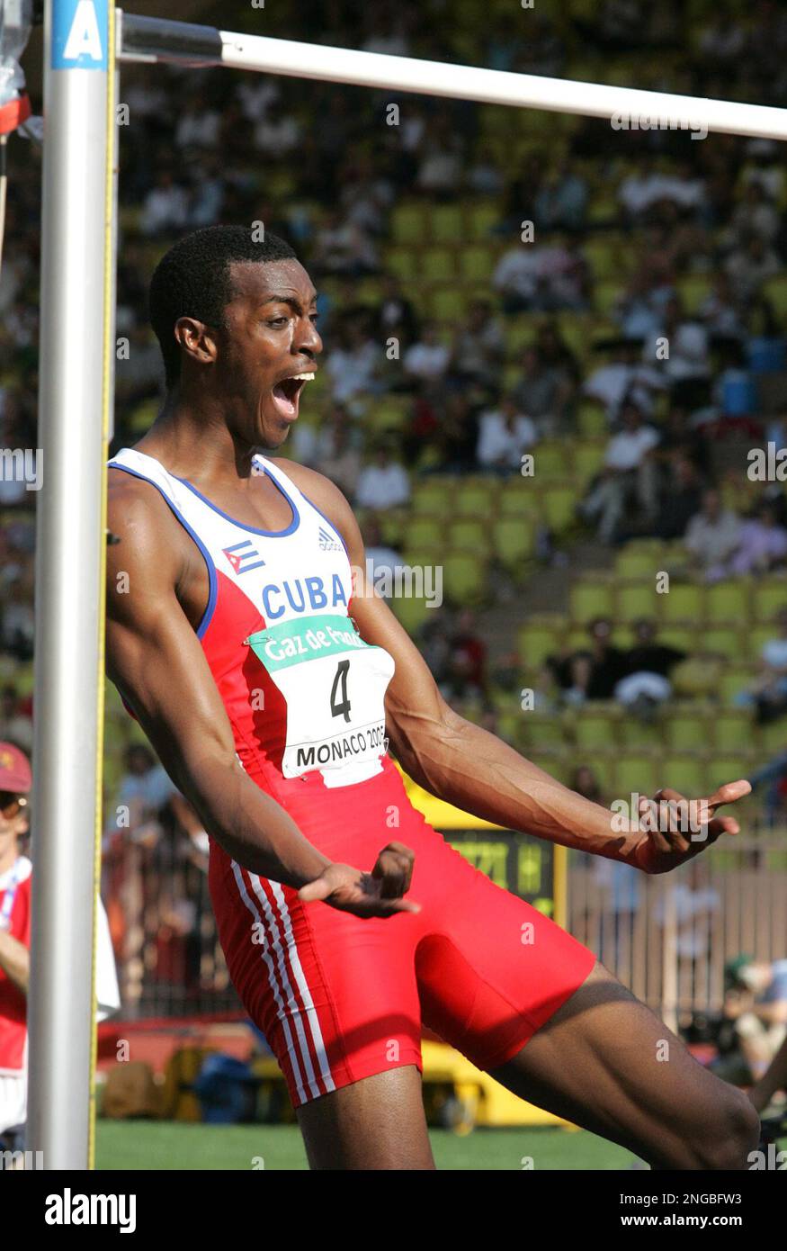 Victor Moya of Cuba reacts after clearing the bar at 2.35 meters and ...