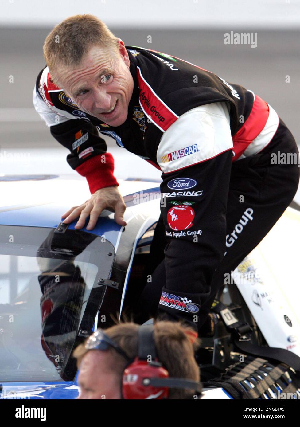 Driver Mark Martin gets out of his car after qualifying for the Chevy ...