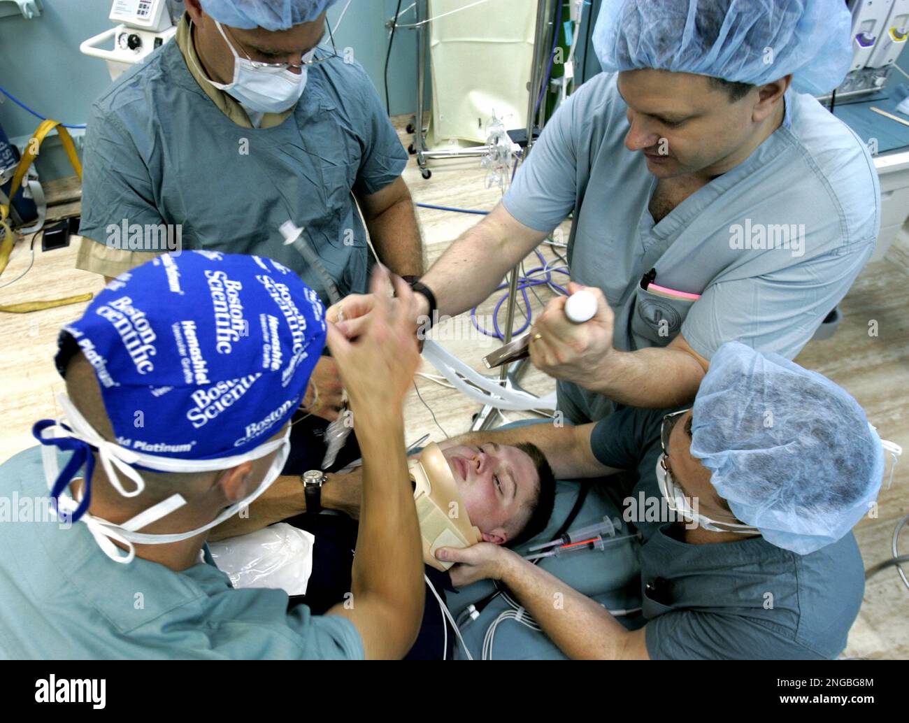 Medical teams aboard the US Navy Military Sealift Command hospital ship ...