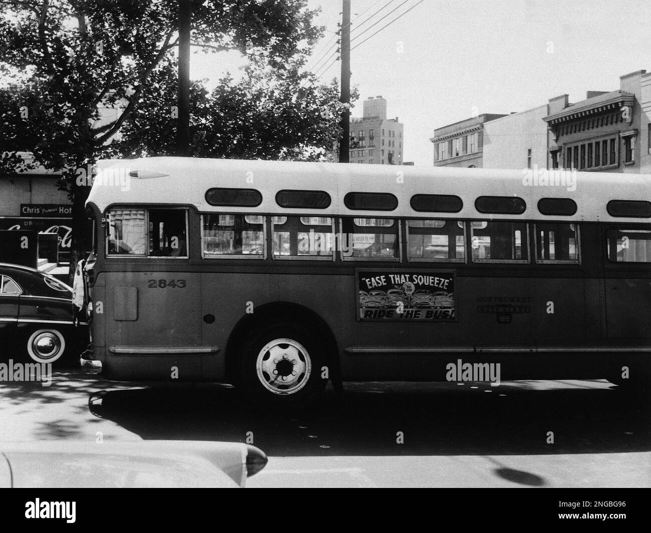 The driver is alone on his empty bus as he moves along downtown ...