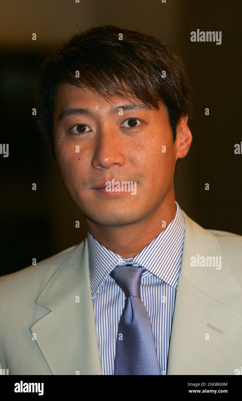 Hong Kong star Leon Lai poses for photographers during a charity event ...