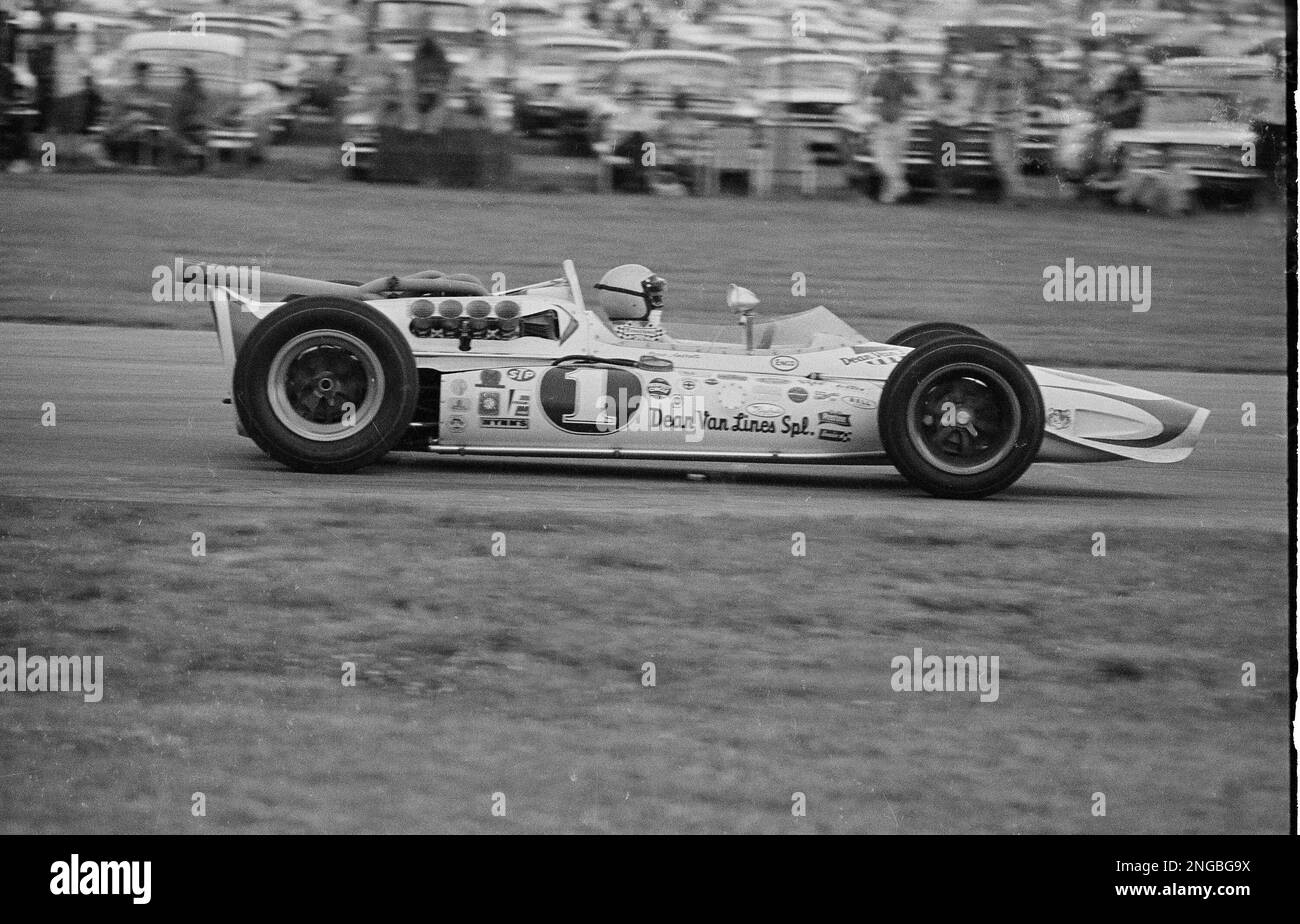 Mario Andretti moves toward the finish line at Indianapolis Raceway ...