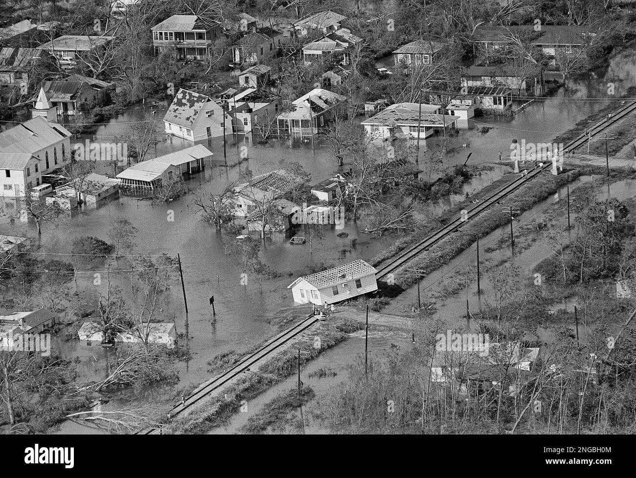 A home lifted by Hurricane Camille rests on railroad tracks between ...