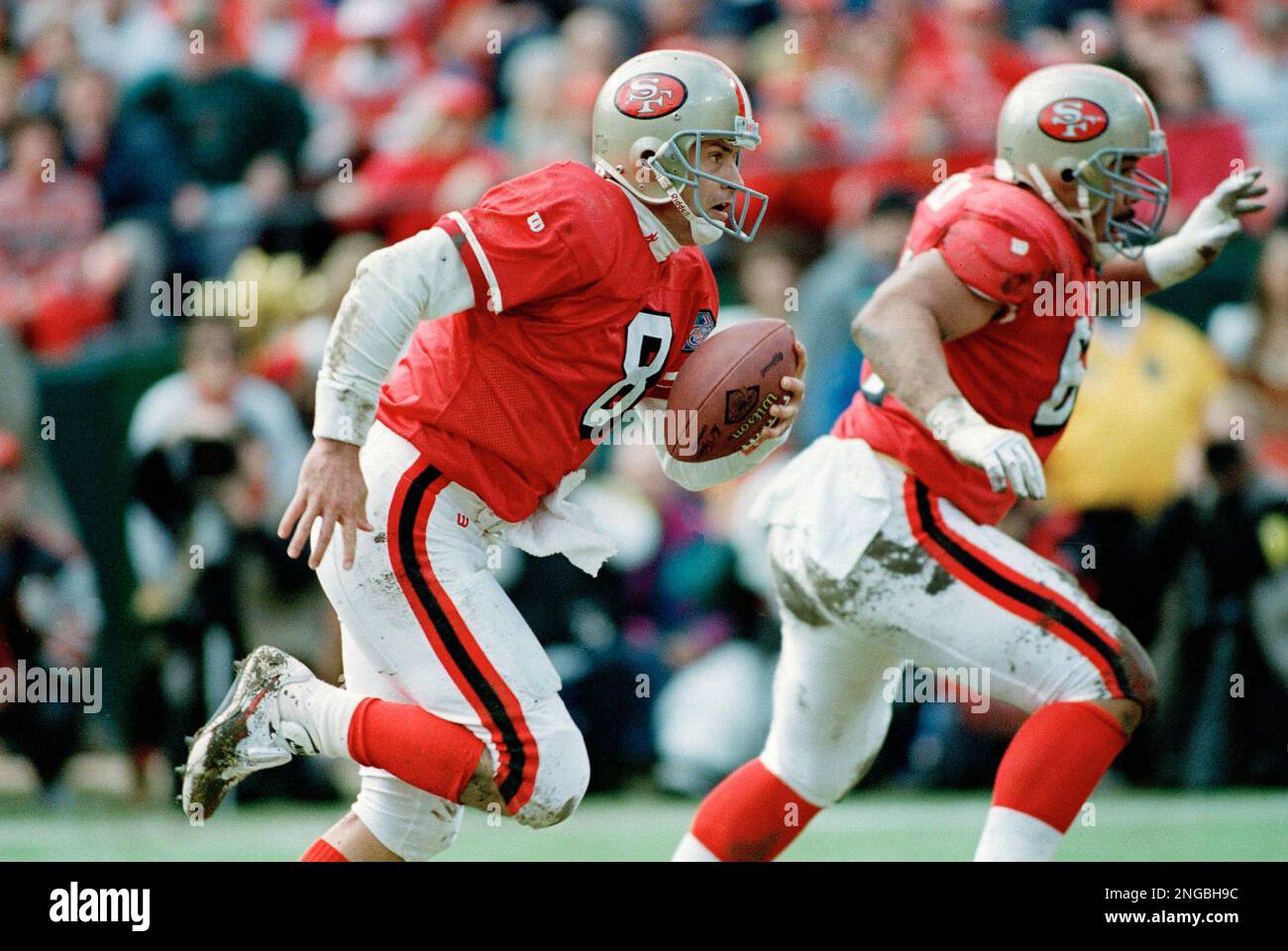 San Francisco 49ers' quarterback Steve Young (8) runs against Dallas ...