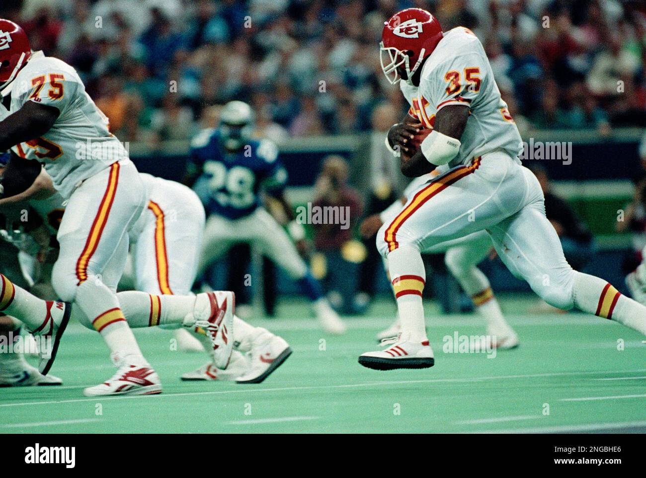 Kansas City Chiefs' running back Christian Okoye (35) makes it to 156 ...
