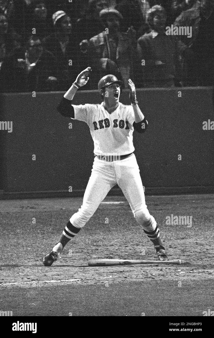 Carlton Fisk slams a 12th-inning home run to give Boston the sixth game ...