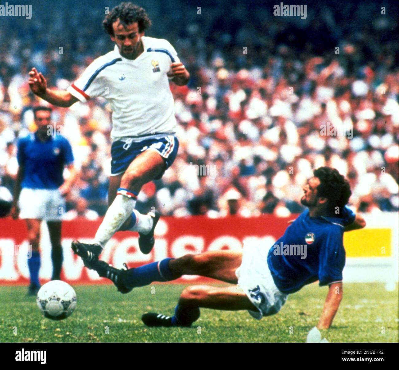 Michel Platini of France dribbles past Italian forward Alessandro ...
