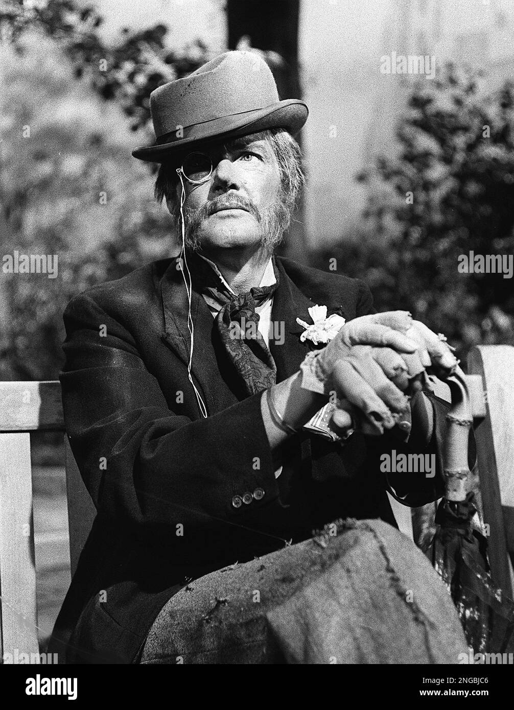 British actor Roger Moore dresses as a tramp, for a television special ...