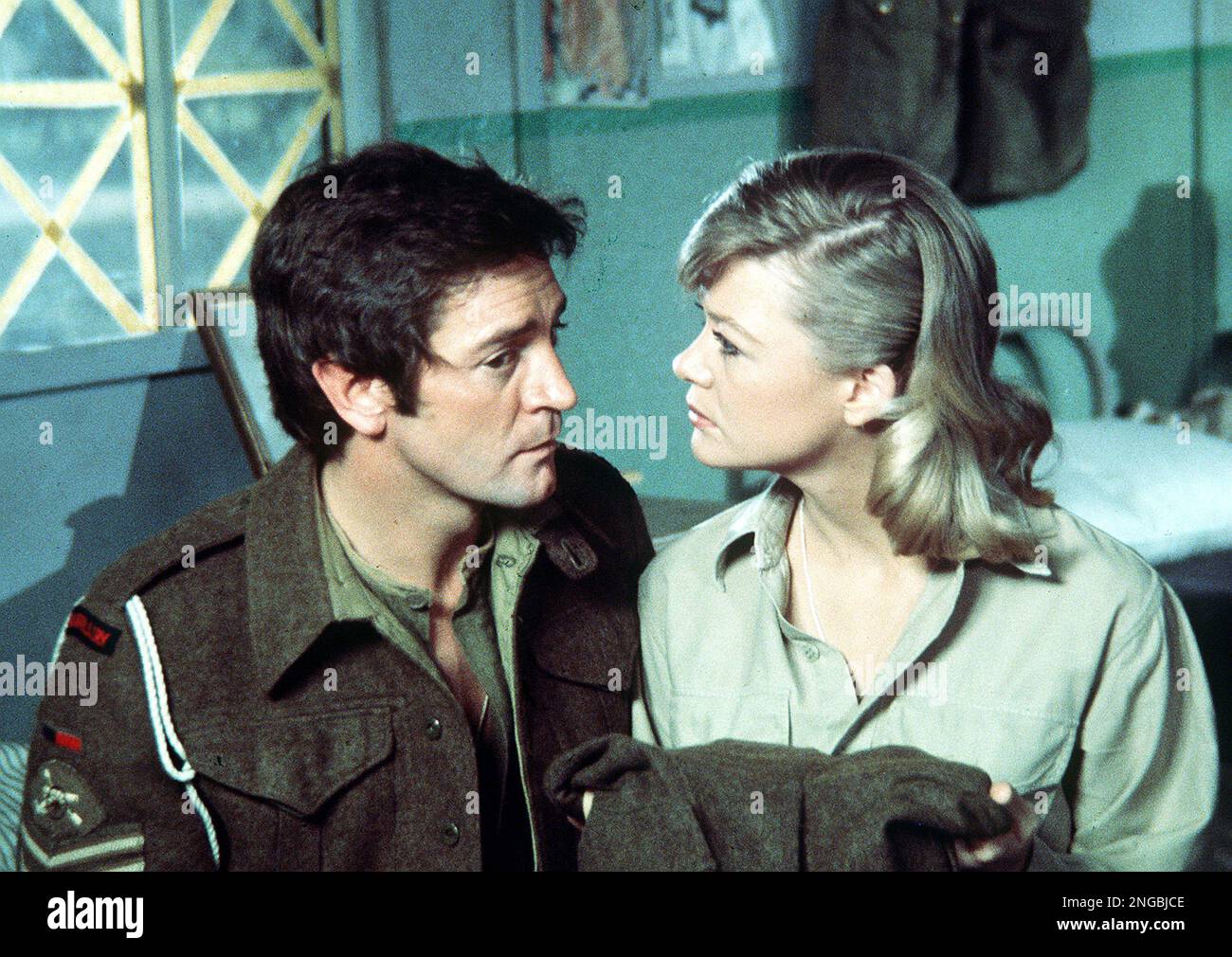 British actress Judy Geeson and British actor Patrick Mower film a ...