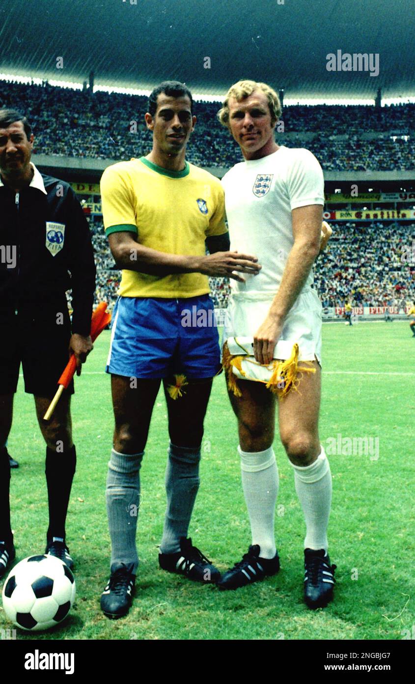 Brazilian captain Torres Carlos Alberto, left, shakes hands with ...