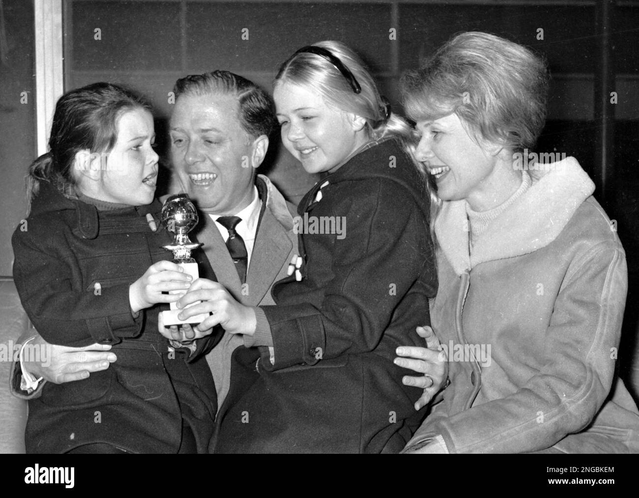 British actor Richard Attenborough shows his Golden Globe Award to his ...