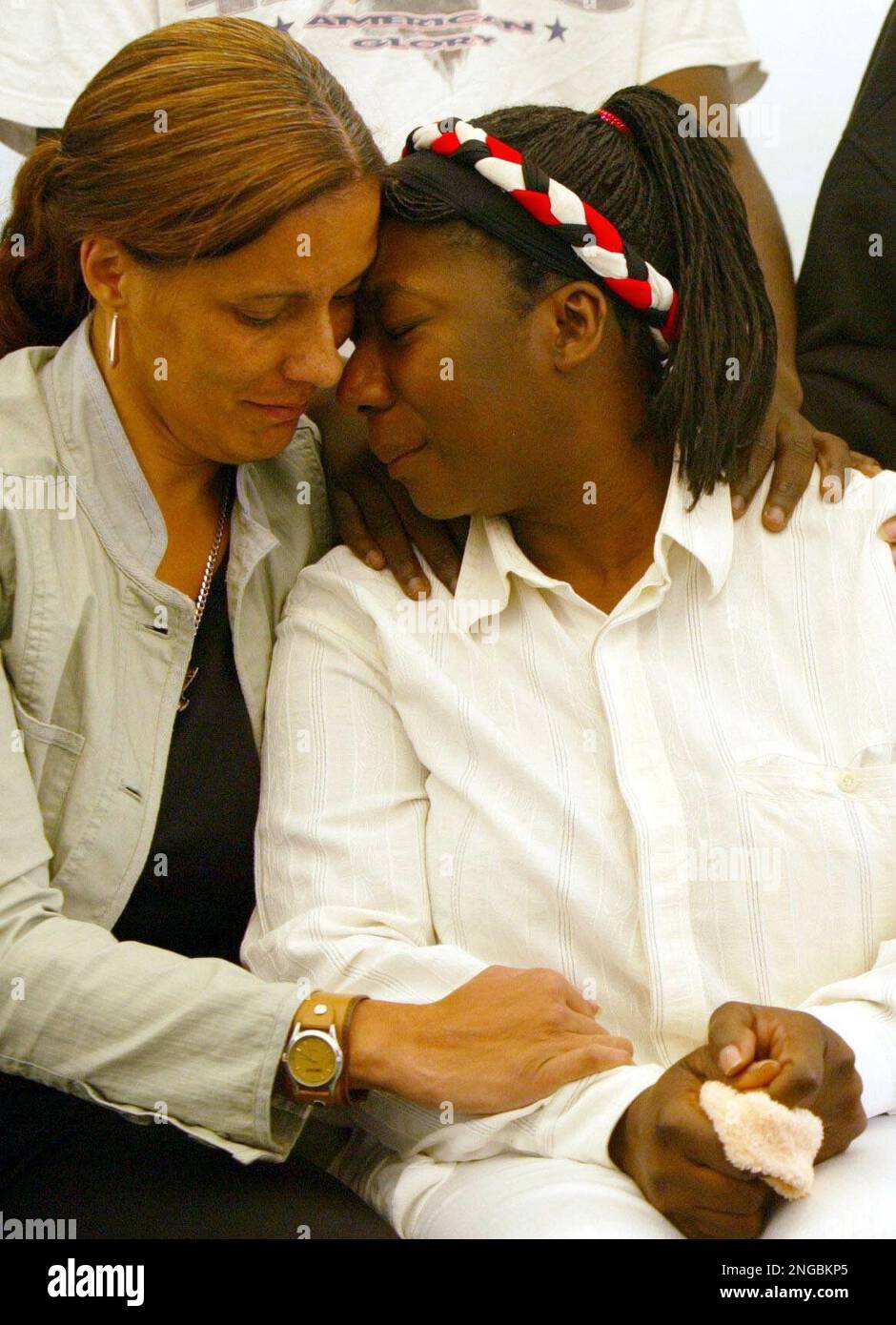 The mother, Gee, of murdered teenager Anthony Walker is hugged by an ...