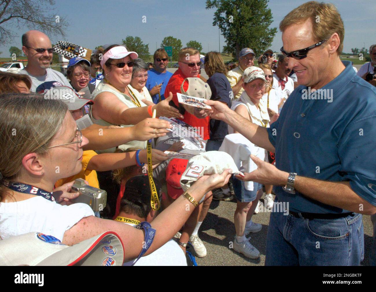 NASCAR driver Rusty Wallace signs autographs for fans after a granstand ...