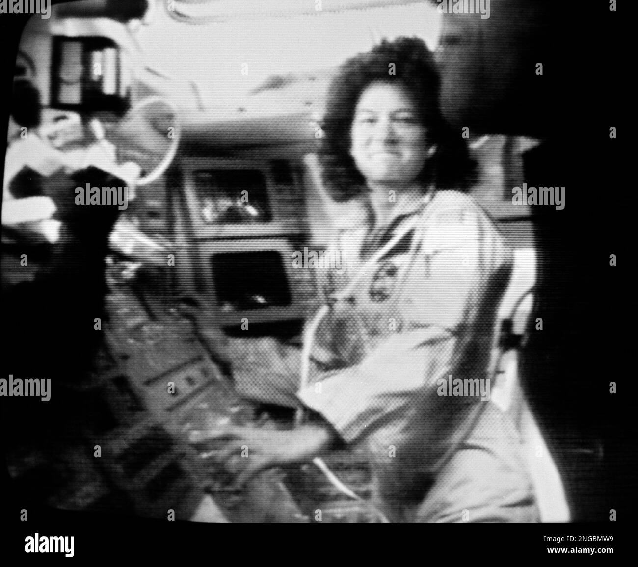 Astronaut Sally Ride is shown at work aboard the space shuttle ...