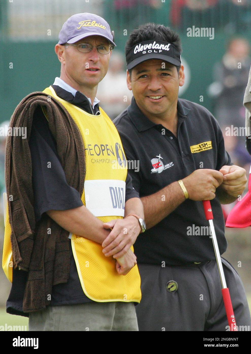 Australia's David Diaz, right, speaks with his caddie Stephen Bridle ...