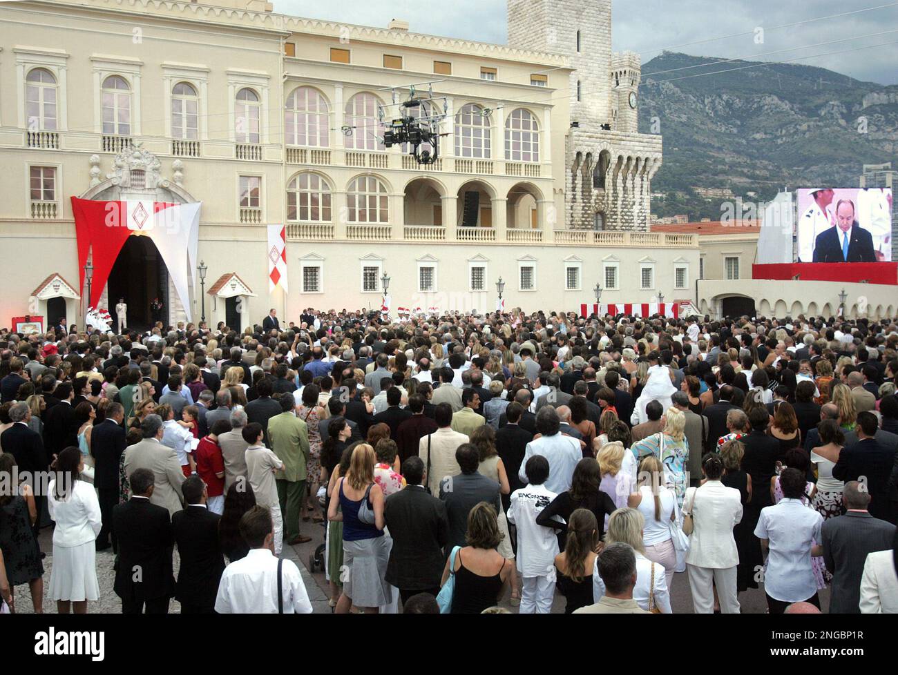A crowd of residents is gathered in front the Monaco palace during a ...