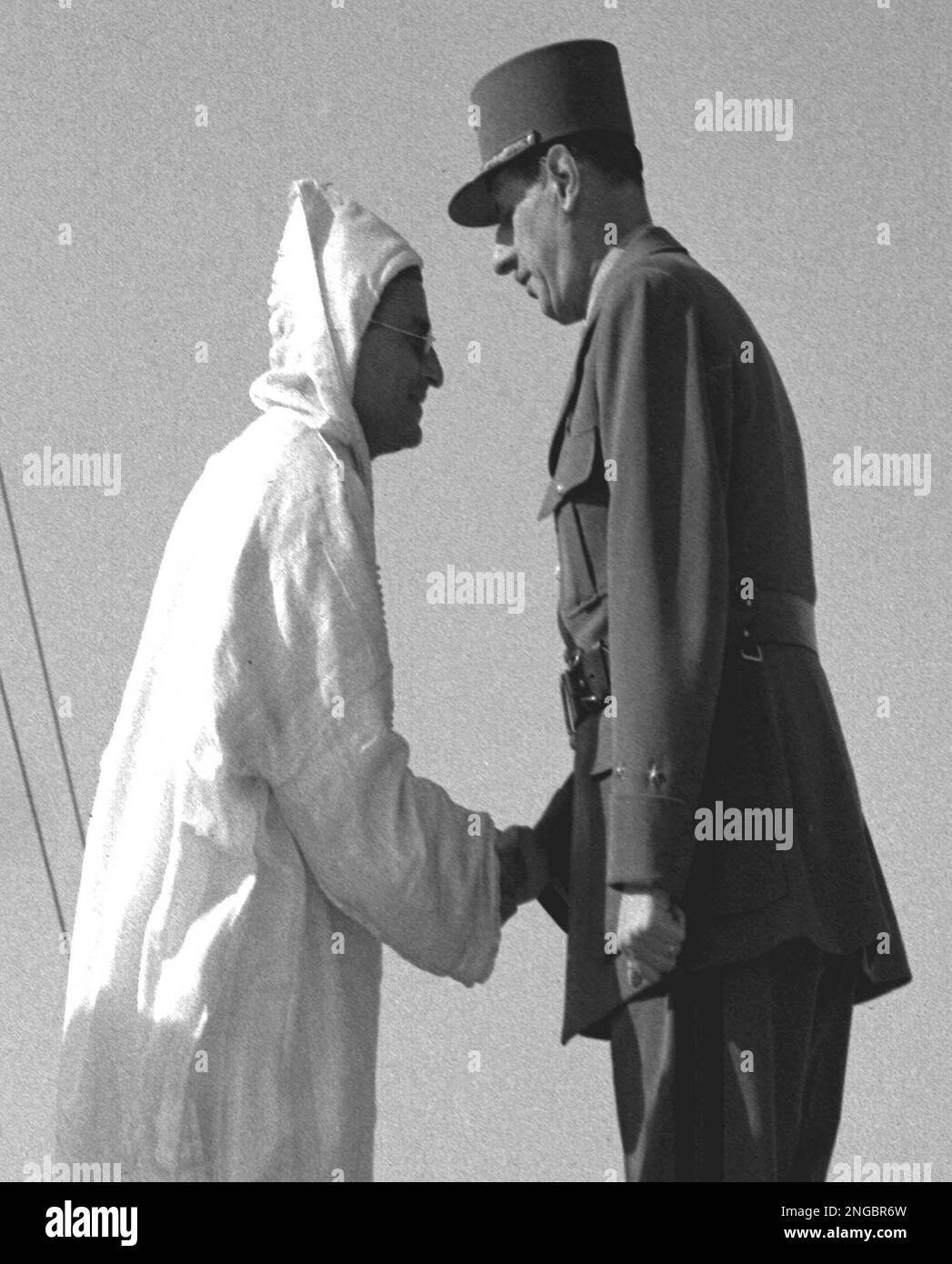 France's Gen Charles De Gaulle, right, shakes hands with King Mohammed ...