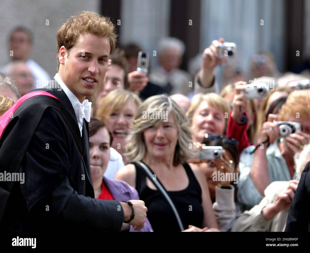 Britain's Prince William talks to the public after attending his ...