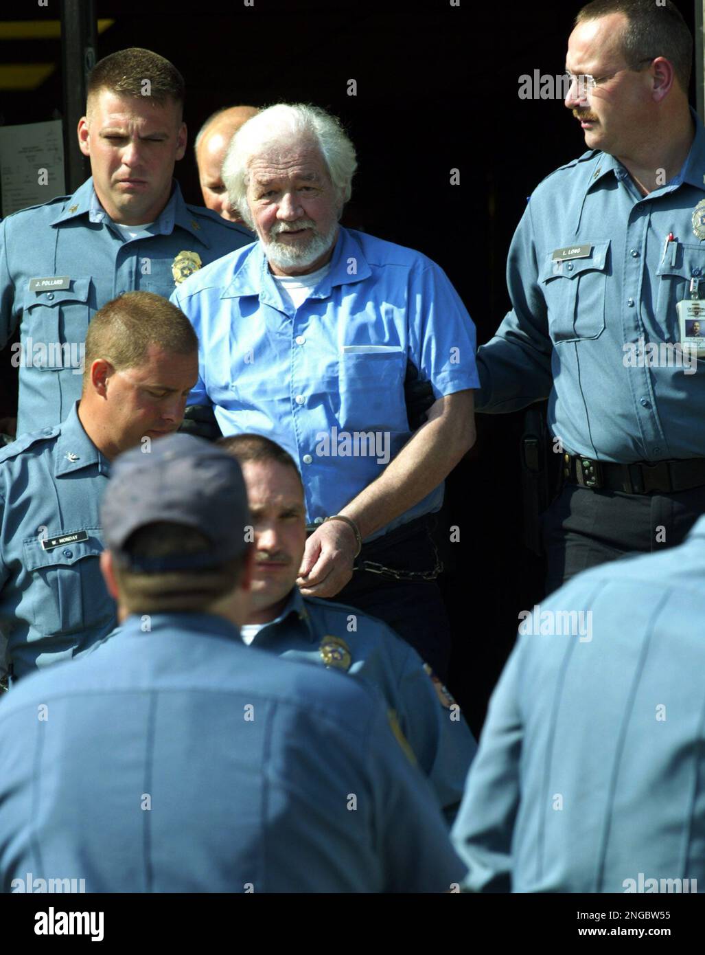 Randolph Dial, center, is led from the in a Greer County courthouse in ...